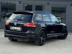 Melns Volkswagen Touareg 2011 Jelgava, ar dzinēja tilpumu 3.00 L un nobraukumu 325 tūkst. km par 12600 €, foto 5 vietnē AUTOMOTO.COM.LV