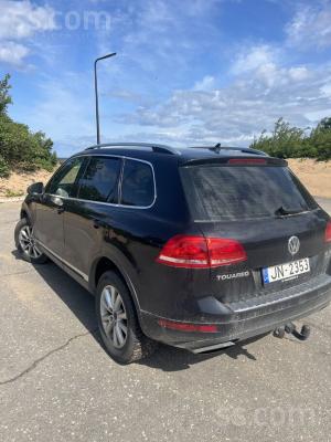 Melns Volkswagen Touareg 2011 Rīga, ar dzinēja tilpumu 3.00 L un nobraukumu 345 tūkst. km par 8000 €, foto  vietnē AUTOMOTO.COM.LV