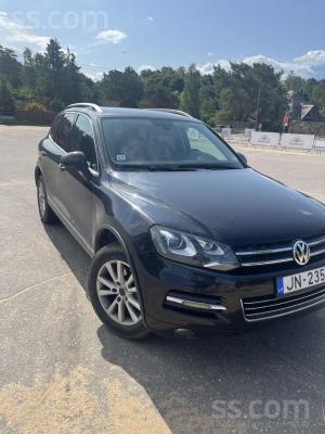 Melns Volkswagen Touareg 2011 Rīga, ar dzinēja tilpumu 3.00 L un nobraukumu 345 tūkst. km par 8000 €, foto 6 vietnē AUTOMOTO.COM.LV