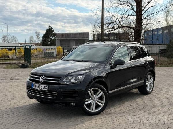 Melns Volkswagen Touareg 2011 Rīga, ar dzinēja tilpumu 4.20 L un nobraukumu 0 tūkst. km par 8750 €, foto 5 vietnē AUTOMOTO.COM.LV