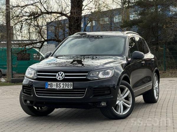 Black Volkswagen Touareg 2011 in Riga, with an engine capacity of 4.20 L and mileage of 0 thousand km for 8750 €, photo 1 on AUTOMOTO.COM.LV