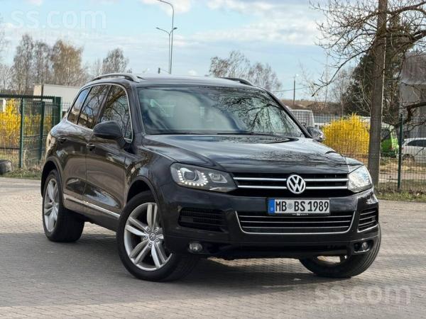 Black Volkswagen Touareg 2011 in Riga, with an engine capacity of 4.20 L and mileage of 0 thousand km for 8750 €, photo 3 on AUTOMOTO.COM.LV