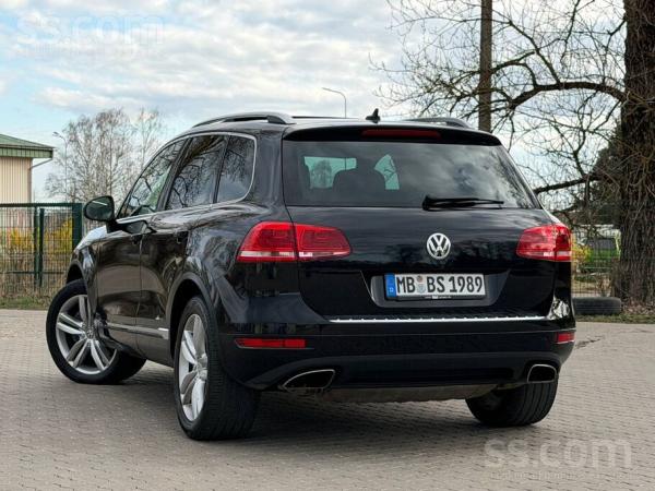 Black Volkswagen Touareg 2011 in Riga, with an engine capacity of 4.20 L and mileage of 0 thousand km for 8750 €, photo 4 on AUTOMOTO.COM.LV