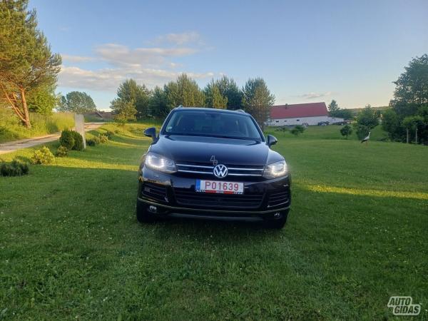 Melns Volkswagen Touareg 2011 Ignalina, ar dzinēja tilpumu 3.00 L un nobraukumu 300 tūkst. km par 11800 €, foto 5 vietnē AUTOMOTO.COM.LV