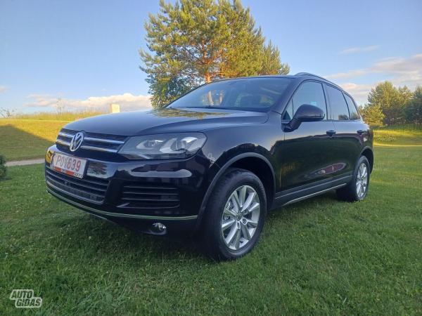 Melns Volkswagen Touareg 2011 Ignalina, ar dzinēja tilpumu 3.00 L un nobraukumu 300 tūkst. km par 11800 €, foto 6 vietnē AUTOMOTO.COM.LV