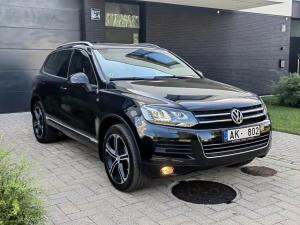Black Volkswagen Touareg 2011 in Riga, with an engine capacity of 3.00 L and mileage of 214 thousand km for 16500 €, photo  on AUTOMOTO.COM.LV
