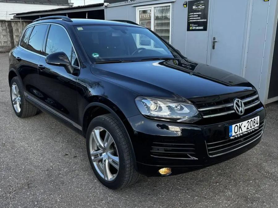 Melns Volkswagen Touareg 2011 Daugavpils, ar dzinēja tilpumu 3.00 L un nobraukumu 164 tūkst. km par 12800 €, foto 1 vietnē AUTOMOTO.COM.LV