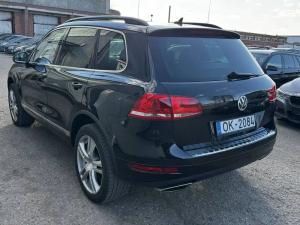 Melns Volkswagen Touareg 2011 Daugavpils, ar dzinēja tilpumu 3.00 L un nobraukumu 164 tūkst. km par 12800 €, foto 5 vietnē AUTOMOTO.COM.LV