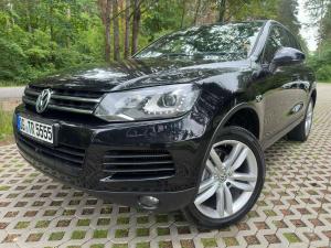 Black Volkswagen Touareg 2011 in Vilnius, with an engine capacity of 2.97 L and mileage of 292 thousand km for 10500 €, photo  on AUTOMOTO.COM.LV