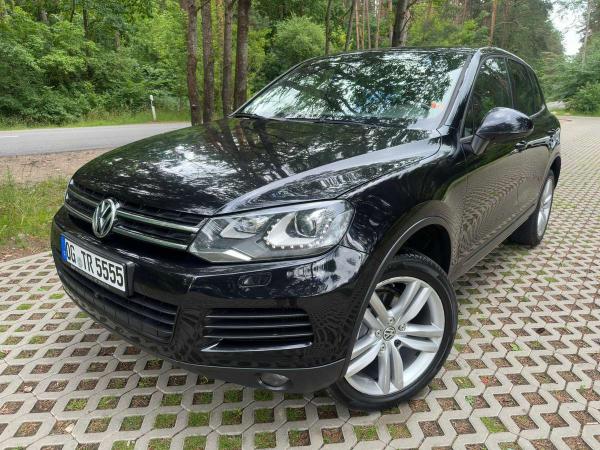 Black Volkswagen Touareg 2011 in Vilnius, with an engine capacity of 2.97 L and mileage of 292 thousand km for 10500 €, photo 2 on AUTOMOTO.COM.LV