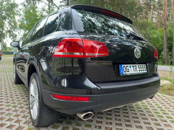 Black Volkswagen Touareg 2011 in Vilnius, with an engine capacity of 2.97 L and mileage of 292 thousand km for 10500 €, photo 5 on AUTOMOTO.COM.LV