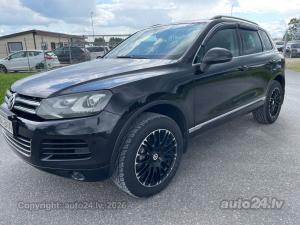 Melns Volkswagen Touareg 2011 Tartu, ar dzinēja tilpumu 3.00 L un nobraukumu 368 tūkst. km par 9990 €, foto  vietnē AUTOMOTO.COM.LV