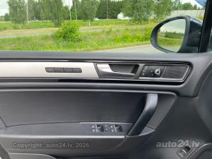 Melns Volkswagen Touareg 2011 Tartu, ar dzinēja tilpumu 3.00 L un nobraukumu 368 tūkst. km par 9990 €, foto 14 vietnē AUTOMOTO.COM.LV