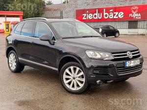 Black Volkswagen Touareg 2011 in Riga, with an engine capacity of 3.00 L and mileage of 490 thousand km for 6850 €, photo  on AUTOMOTO.COM.LV