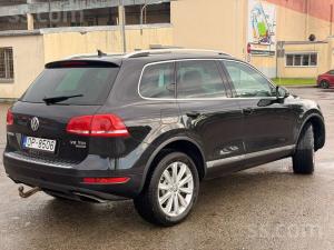 Melns Volkswagen Touareg 2011 Rīga, ar dzinēja tilpumu 3.00 L un nobraukumu 490 tūkst. km par 6850 €, foto 6 vietnē AUTOMOTO.COM.LV