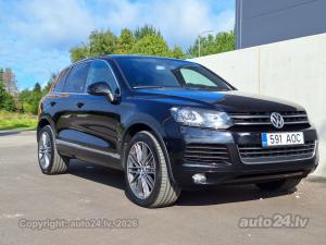 Black Volkswagen Touareg 2011 in Tallinn, with an engine capacity of 3.00 L and mileage of 197 thousand km for 10500 €, photo  on AUTOMOTO.COM.LV