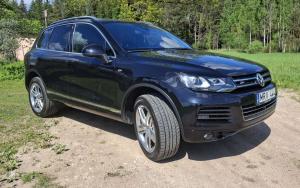 Black Volkswagen Touareg 2011 in Vilnius, with an engine capacity of 2.97 L and mileage of 315 thousand km for 10850 €, photo 4 on AUTOMOTO.COM.LV