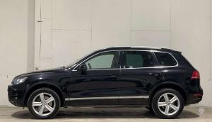 Melns Volkswagen Touareg 2011 Klaipėda, ar dzinēja tilpumu 4.13 L un nobraukumu 333 tūkst. km par 10500 €, foto 14 vietnē AUTOMOTO.COM.LV