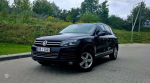 Black Volkswagen Touareg 2011 in Vilnius, with an engine capacity of 3.00 L and mileage of 288 thousand km for 8900 €, photo  on AUTOMOTO.COM.LV