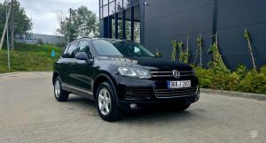 Black Volkswagen Touareg 2011 in Vilnius, with an engine capacity of 3.00 L and mileage of 288 thousand km for 8900 €, photo 3 on AUTOMOTO.COM.LV