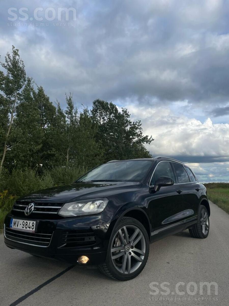 Melns Volkswagen Touareg 2011 Rīga, ar dzinēja tilpumu 3.00 L un nobraukumu 309 tūkst. km par 12000 €, foto 1 vietnē AUTOMOTO.COM.LV