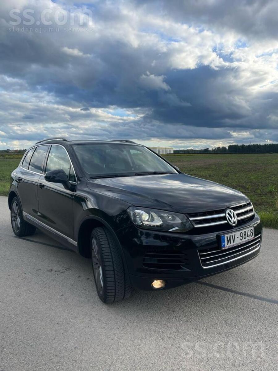 Melns Volkswagen Touareg 2011 Rīga, ar dzinēja tilpumu 3.00 L un nobraukumu 309 tūkst. km par 12000 €, foto 3 vietnē AUTOMOTO.COM.LV