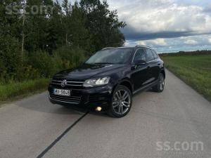 Melns Volkswagen Touareg 2011 Rīga, ar dzinēja tilpumu 3.00 L un nobraukumu 309 tūkst. km par 12000 €, foto 5 vietnē AUTOMOTO.COM.LV