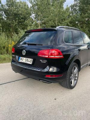 Melns Volkswagen Touareg 2011 Rīga, ar dzinēja tilpumu 3.00 L un nobraukumu 309 tūkst. km par 12000 €, foto 6 vietnē AUTOMOTO.COM.LV