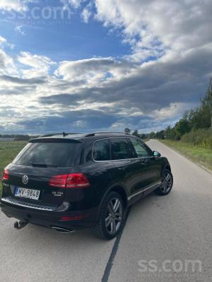 Melns Volkswagen Touareg 2011 Rīga, ar dzinēja tilpumu 3.00 L un nobraukumu 309 tūkst. km par 12000 €, foto 8 vietnē AUTOMOTO.COM.LV