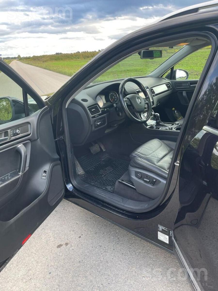 Melns Volkswagen Touareg 2011 Rīga, ar dzinēja tilpumu 3.00 L un nobraukumu 309 tūkst. km par 12000 €, foto 9 vietnē AUTOMOTO.COM.LV