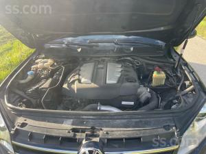 Melns Volkswagen Touareg 2011 Rīga, ar dzinēja tilpumu 3.00 L un nobraukumu 309 tūkst. km par 12000 €, foto 20 vietnē AUTOMOTO.COM.LV