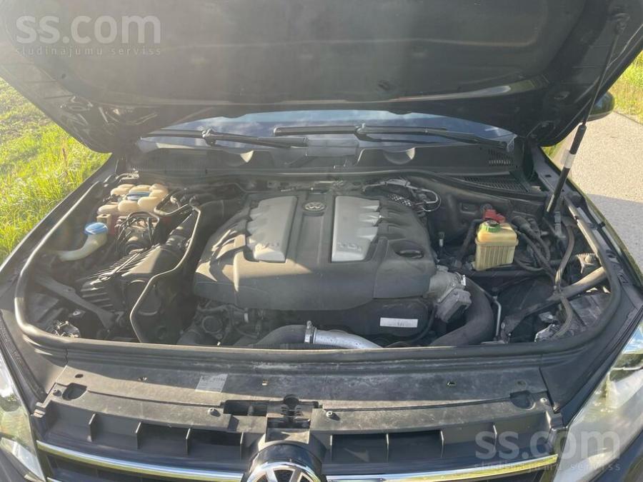 Melns Volkswagen Touareg 2011 Rīga, ar dzinēja tilpumu 3.00 L un nobraukumu 309 tūkst. km par 12000 €, foto 20 vietnē AUTOMOTO.COM.LV
