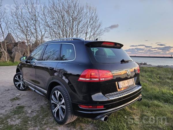 Melns Volkswagen Touareg 2012 Liepāja, ar dzinēja tilpumu 3.00 L un nobraukumu 496 tūkst. km par 11950 €, foto 6 vietnē AUTOMOTO.COM.LV