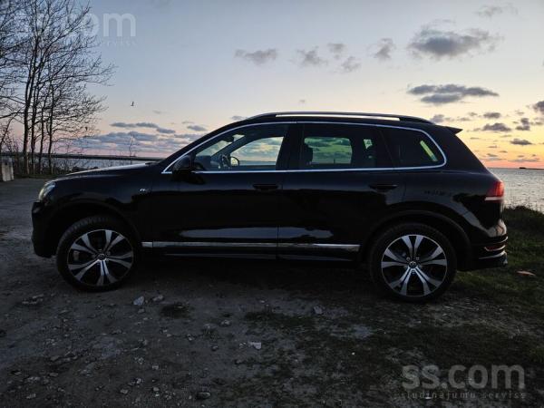 Melns Volkswagen Touareg 2012 Liepāja, ar dzinēja tilpumu 3.00 L un nobraukumu 496 tūkst. km par 11950 €, foto 7 vietnē AUTOMOTO.COM.LV