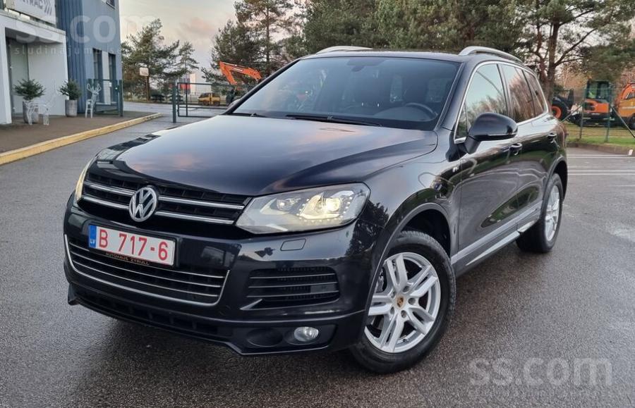 Melns Volkswagen Touareg 2012 Rīga, ar dzinēja tilpumu 3.00 L un nobraukumu 295 tūkst. km par 11990 €, foto 1 vietnē AUTOMOTO.COM.LV