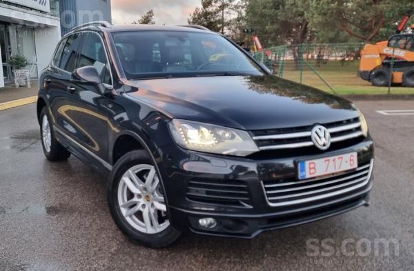 Black Volkswagen Touareg 2012 in Riga, with an engine capacity of 3.00 L and mileage of 295 thousand km for 11990 €, photo 3 on AUTOMOTO.COM.LV