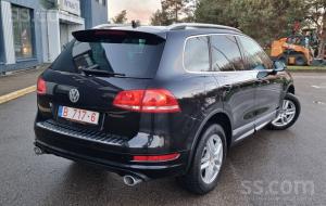 Melns Volkswagen Touareg 2012 Rīga, ar dzinēja tilpumu 3.00 L un nobraukumu 295 tūkst. km par 11990 €, foto 6 vietnē AUTOMOTO.COM.LV