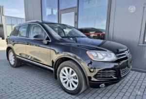 Black Volkswagen Touareg 2012 in Siauliai, with an engine capacity of 3.60 L and mileage of 210 thousand km for 8990 €, photo  on AUTOMOTO.COM.LV