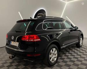 Melns Volkswagen Touareg 2012 Marijampole, ar dzinēja tilpumu 2.97 L un nobraukumu 237 tūkst. km par 11450 €, foto 23 vietnē AUTOMOTO.COM.LV