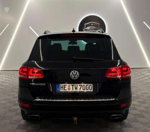 Melns Volkswagen Touareg 2012 Marijampole, ar dzinēja tilpumu 2.97 L un nobraukumu 237 tūkst. km par 11450 €, foto 25 vietnē AUTOMOTO.COM.LV
