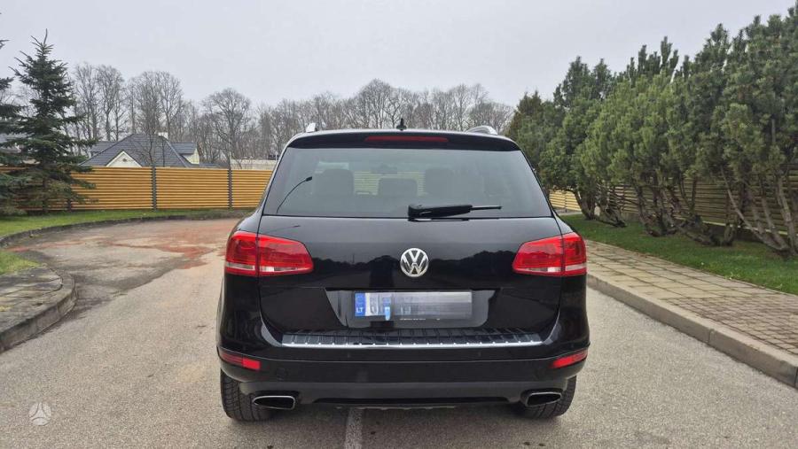 Melns Volkswagen Touareg 2012 Klaipėda, ar dzinēja tilpumu 2.97 L un nobraukumu 331 tūkst. km par 7850 €, foto 12 vietnē AUTOMOTO.COM.LV