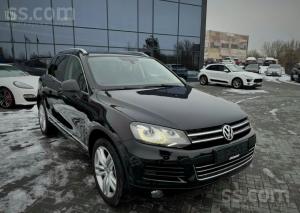Black Volkswagen Touareg 2012 in Telschi, with an engine capacity of 3.00 L and mileage of 248 thousand km for 11799 €, photo  on AUTOMOTO.COM.LV