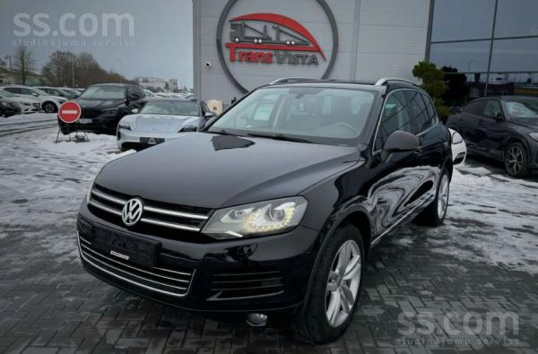 Black Volkswagen Touareg 2012 in Telschi, with an engine capacity of 3.00 L and mileage of 248 thousand km for 11799 €, photo 3 on AUTOMOTO.COM.LV
