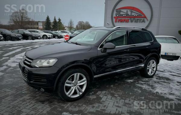 Black Volkswagen Touareg 2012 in Telschi, with an engine capacity of 3.00 L and mileage of 248 thousand km for 11799 €, photo 7 on AUTOMOTO.COM.LV
