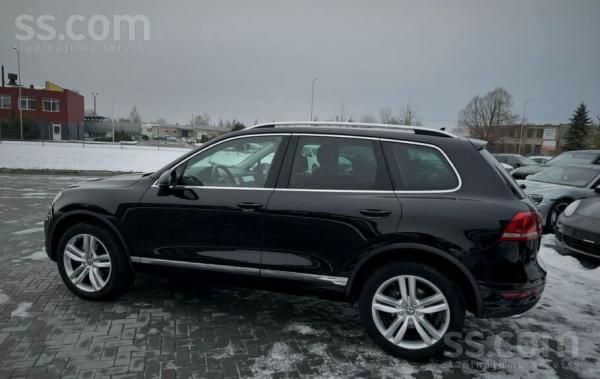 Black Volkswagen Touareg 2012 in Telschi, with an engine capacity of 3.00 L and mileage of 248 thousand km for 11799 €, photo 9 on AUTOMOTO.COM.LV