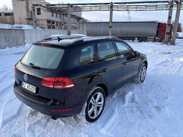 Melns Volkswagen Touareg 2012 Mažeikiai, ar dzinēja tilpumu 2.97 L un nobraukumu 178 tūkst. km par 8999 €, foto 5 vietnē AUTOMOTO.COM.LV