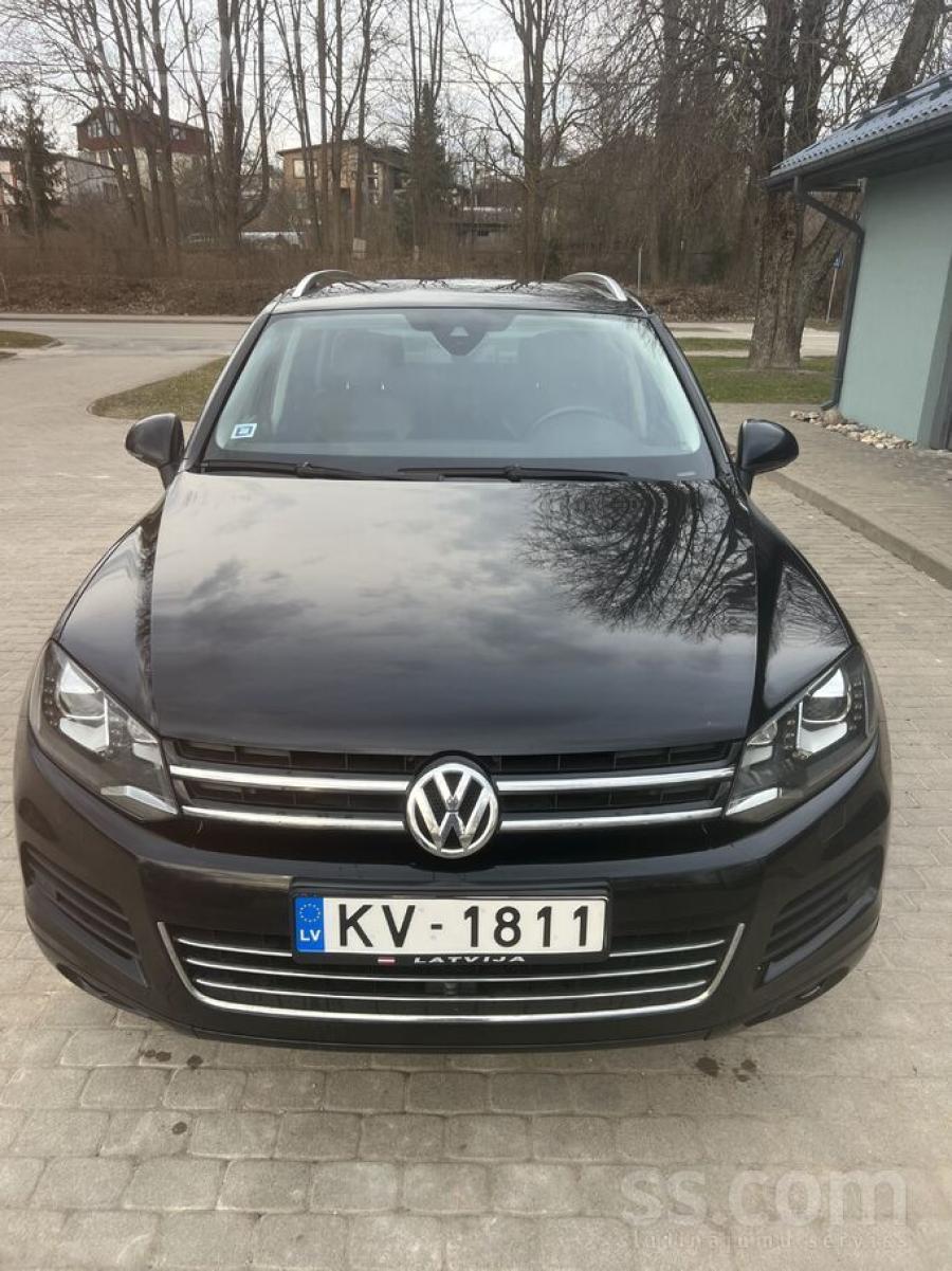 Melns Volkswagen Touareg 2012 Ogre, ar dzinēja tilpumu 3.00 L un nobraukumu 164 tūkst. km par 12250 €, foto 1 vietnē AUTOMOTO.COM.LV