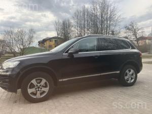 Melns Volkswagen Touareg 2012 Ogre, ar dzinēja tilpumu 3.00 L un nobraukumu 164 tūkst. km par 12250 €, foto 3 vietnē AUTOMOTO.COM.LV