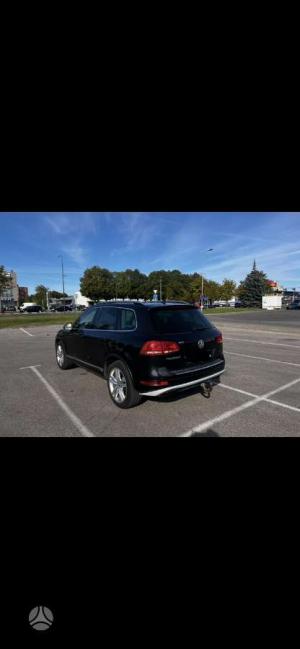 Melns Volkswagen Touareg 2012 Kauņa, ar dzinēja tilpumu 2.97 L un nobraukumu 295 tūkst. km par 14499 €, foto 4 vietnē AUTOMOTO.COM.LV