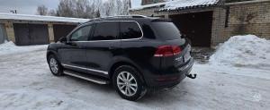 Black Volkswagen Touareg 2012 in Vilnius, with an engine capacity of 2.97 L and mileage of 273 thousand km for 13000 €, photo 3 on AUTOMOTO.COM.LV